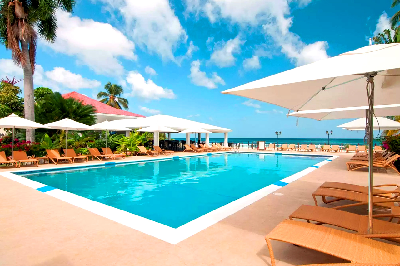 radisson grenada beach resort pool courtyard luxury escape ...